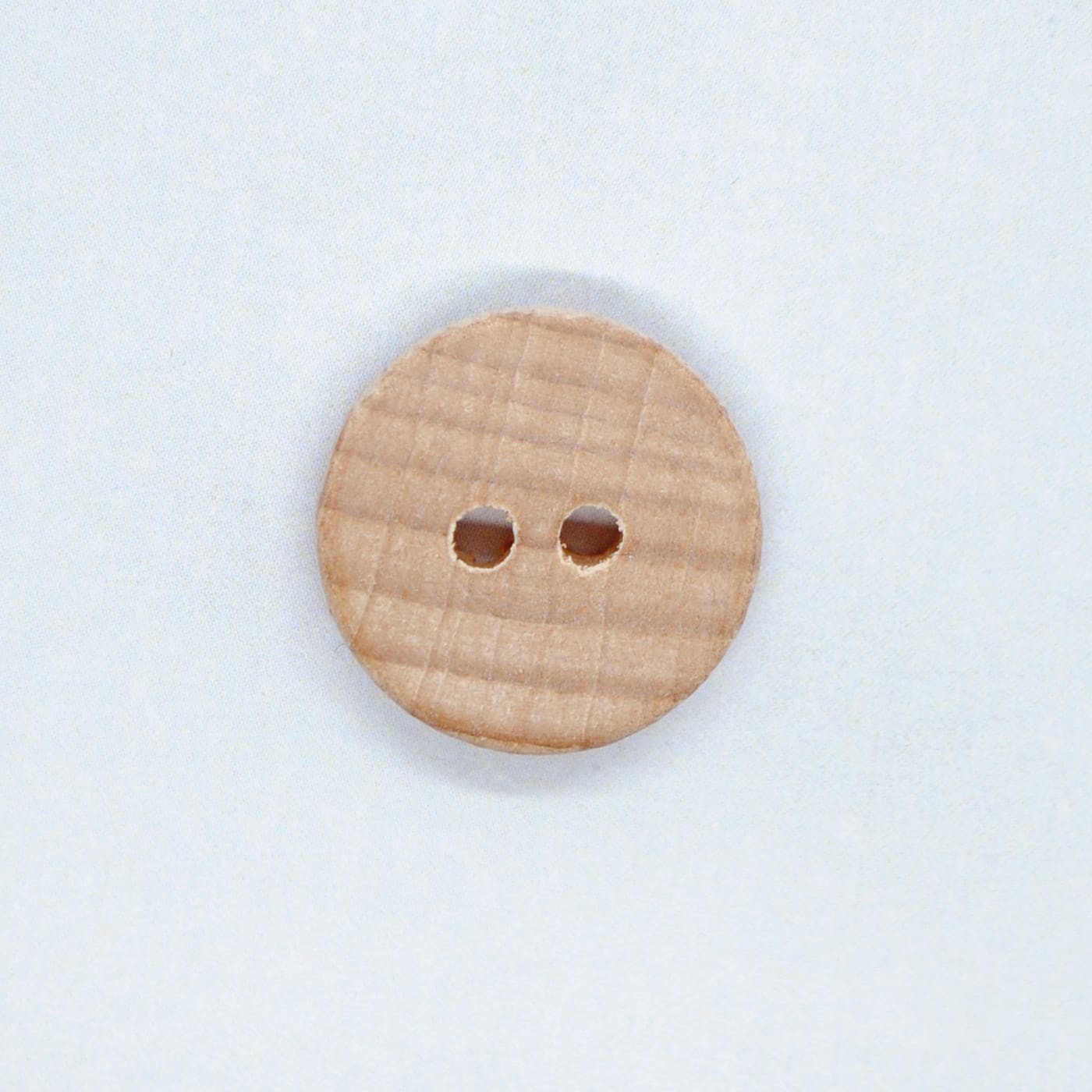 Knappar 15mm træ, 2 hol – Berglon